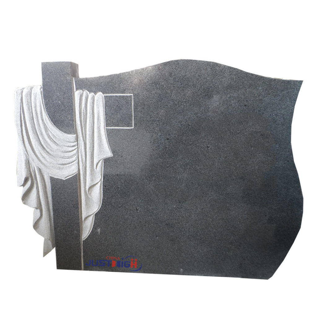 Hand carved cross headstone in G654