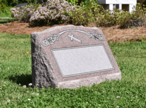 What is the difference between upright and slant headstones?