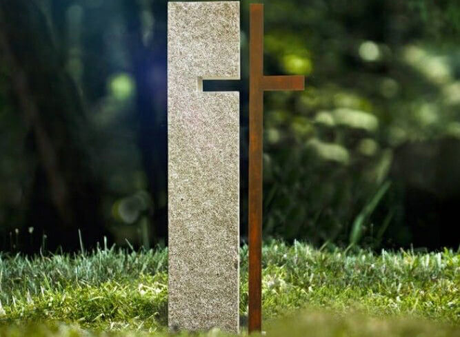 What is one of the top symbols used on a cemetery marker?